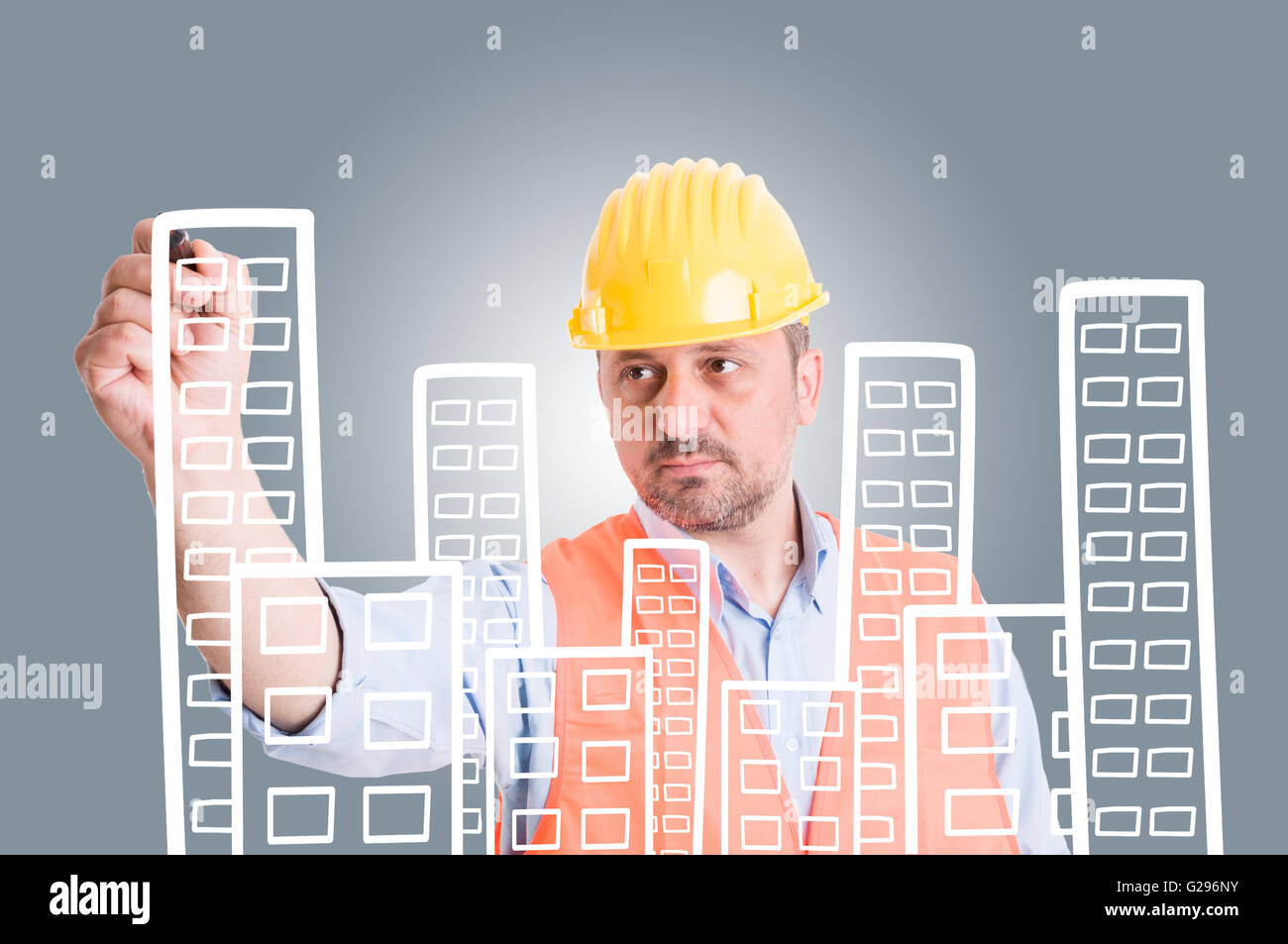 Architect or engineer drawing building on transparent screen using ...