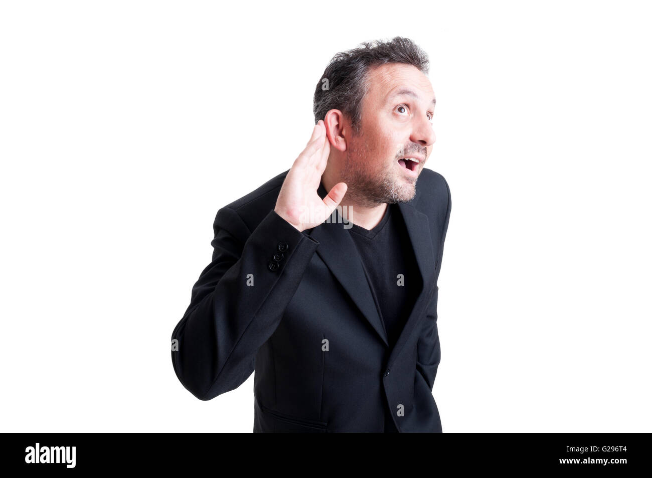 Man making eavesdropping gesture leaning the ear to the camera Stock ...