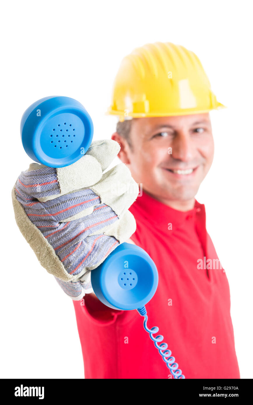 Contact construction company concept with builder holding phone Stock ...