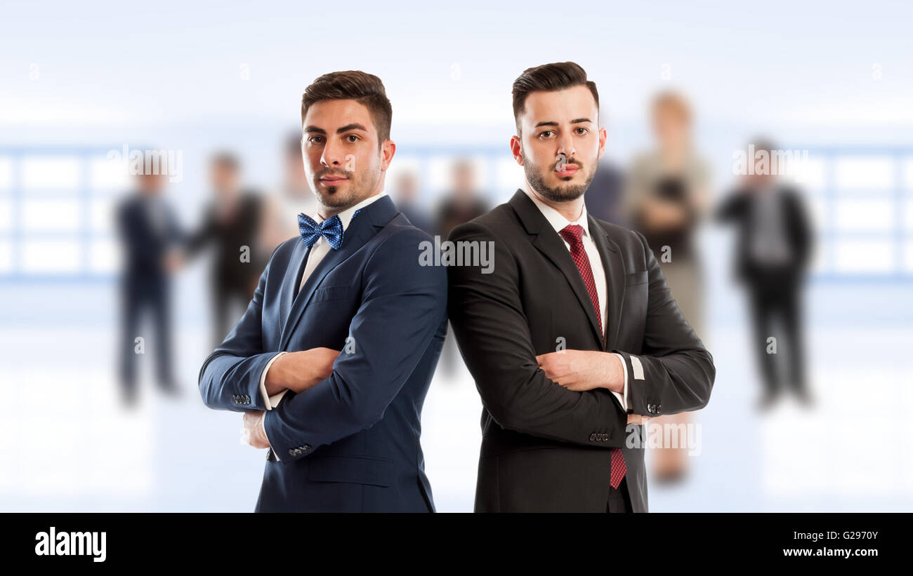 Two business men standing back hi-res stock photography and images - Alamy