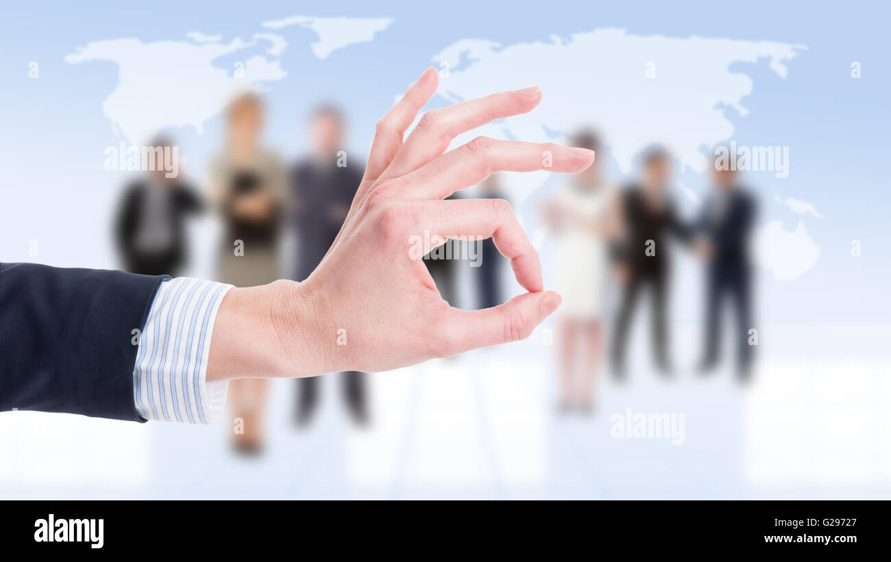 Business woman hand showing perfect gesture on business people ...