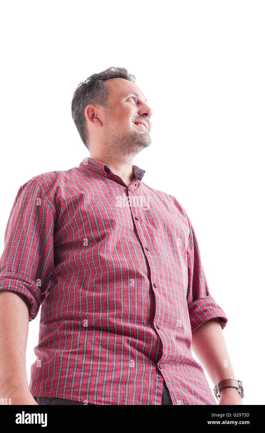 Happy smiling man looking up. Hero shot or low angle concept Stock ...