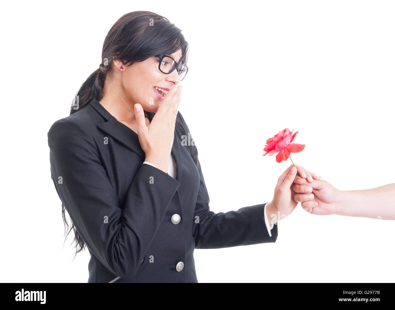 Surprised woman receiving a flower from boyfriend or husband Stock ...