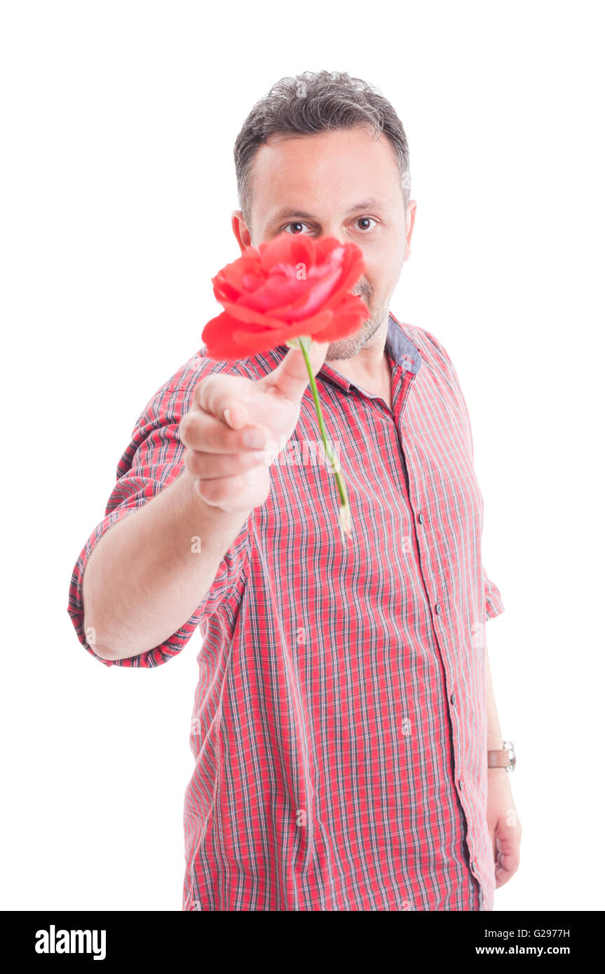 man throwing a red flower to the camera as a romantic gesture Stock ...