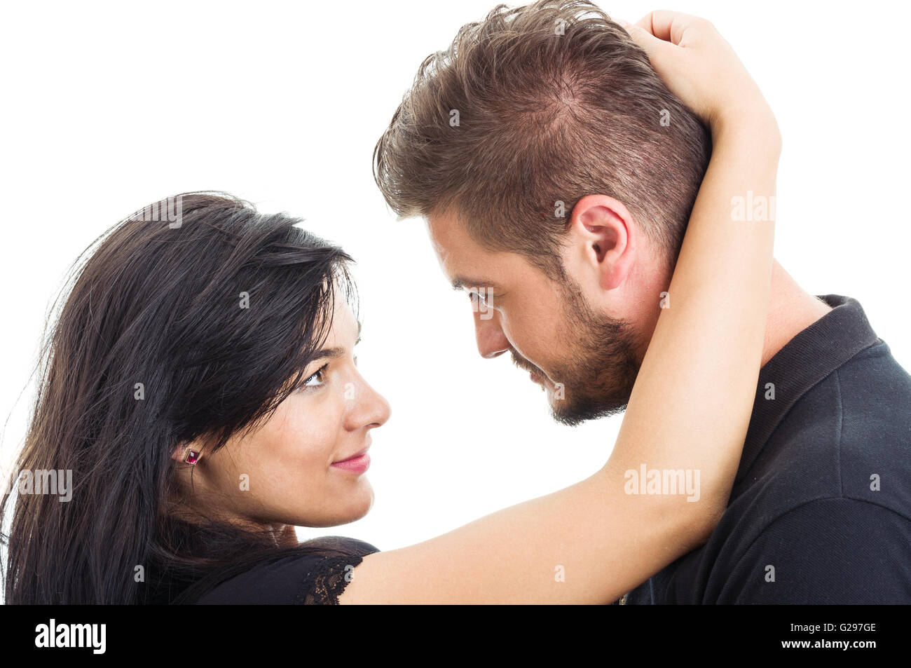 Couple in love looking at each other on white background Stock Photo ...