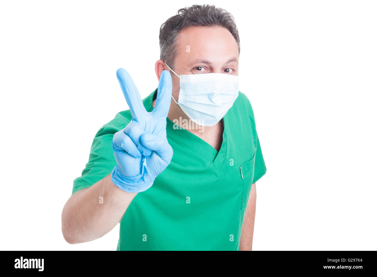 Happy doctor showing victory gesture with two fingers Stock Photo - Alamy