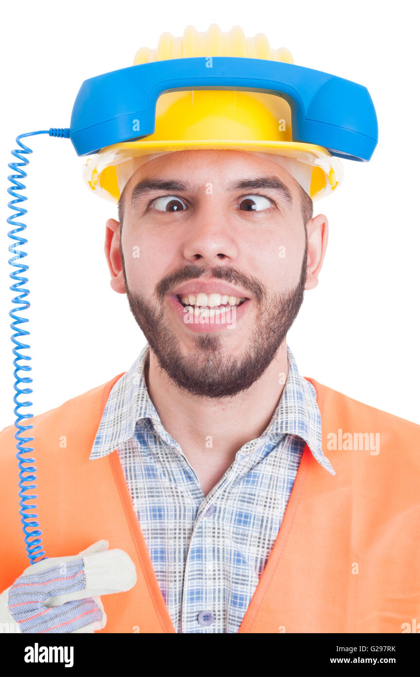 Funny contact person of construction company holding phone on helmet ...