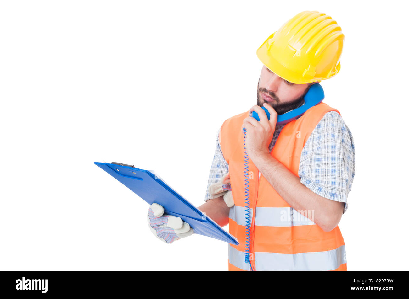 Busy contractor using phone while holding clipboard. Support or ...
