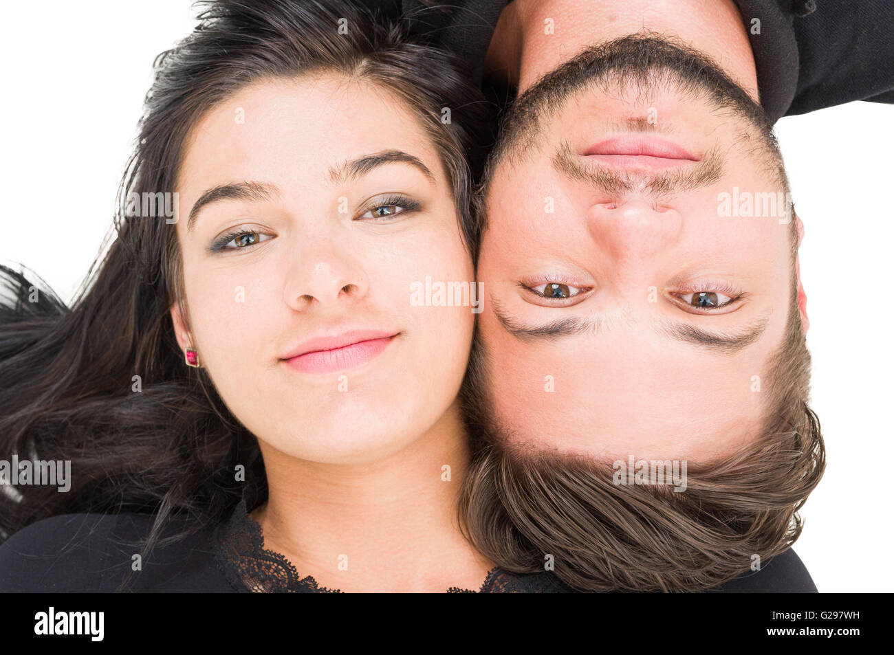 Top view of a happy couple heads to each other on white floor Stock ...