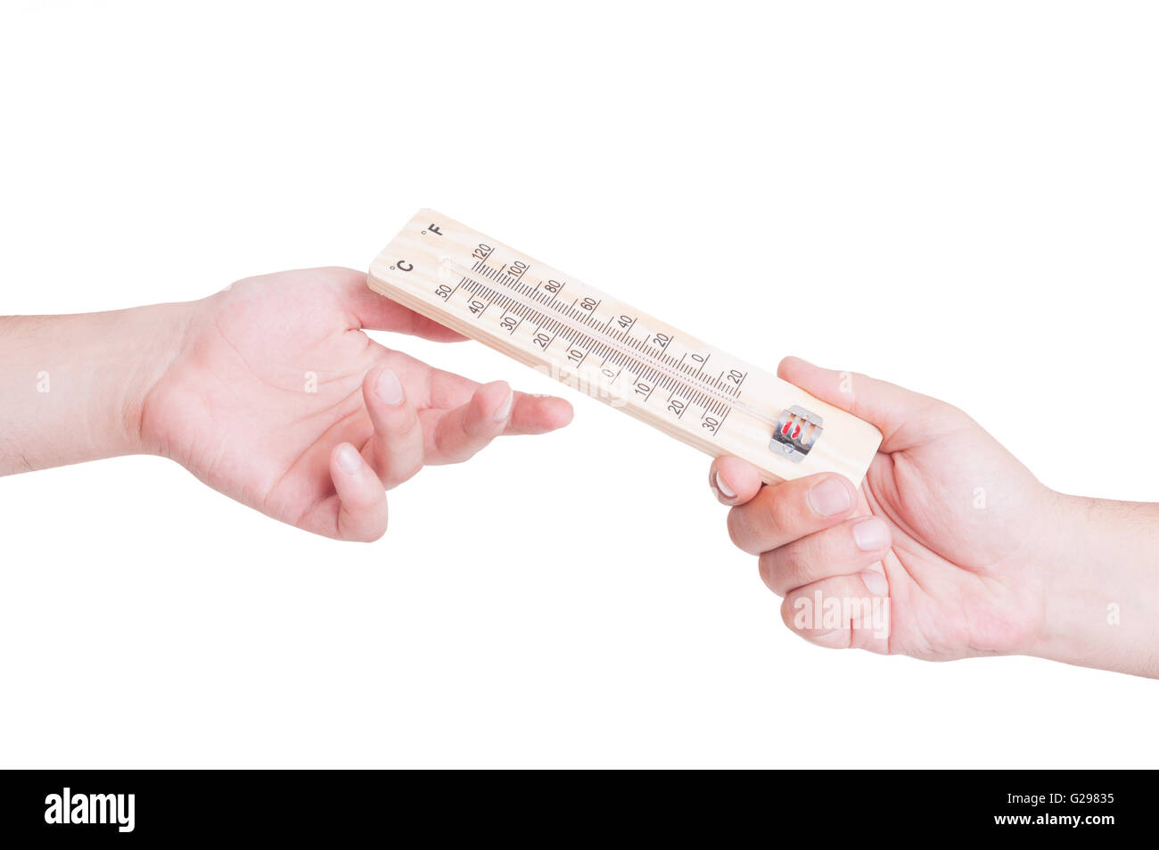 Hand giving or handing thermometer as summer heat and heatwave concept ...