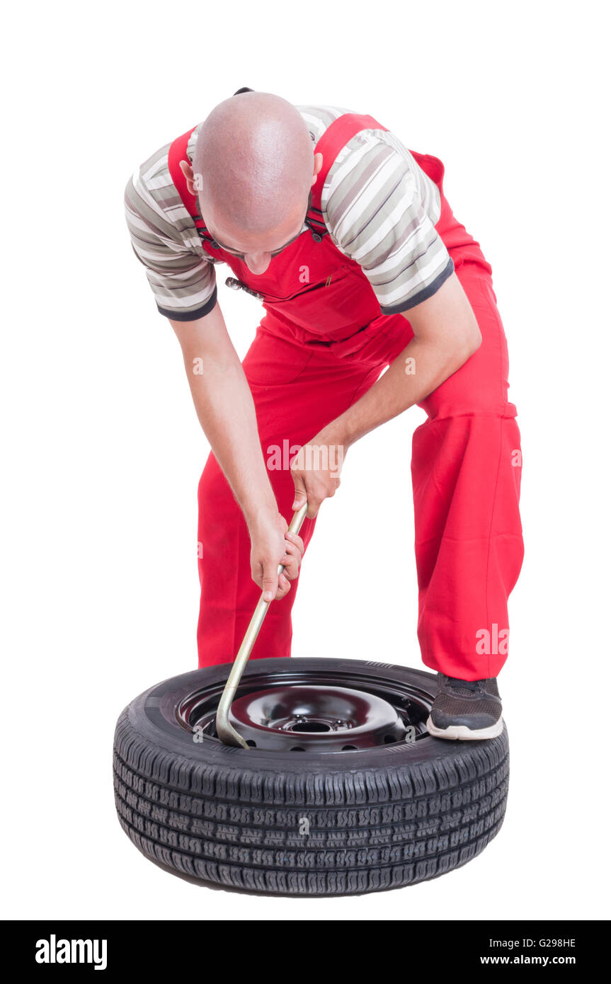 Mechanic working hard on car hi-res stock photography and images - Alamy
