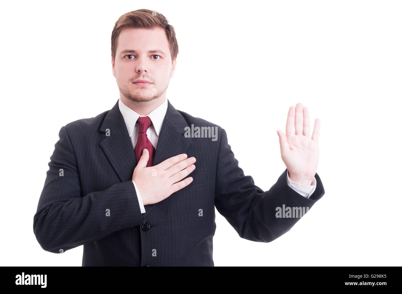 Man making oath with hand on chest hi-res stock photography and images ...