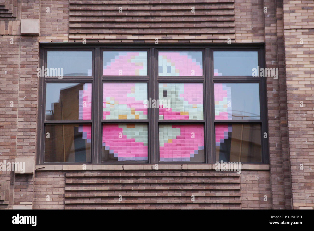 Pictures and writings made with Post-its hanging in office buildings in ...