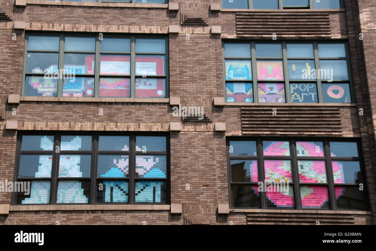 Pictures and writings made with Post-its hanging in office buildings in ...
