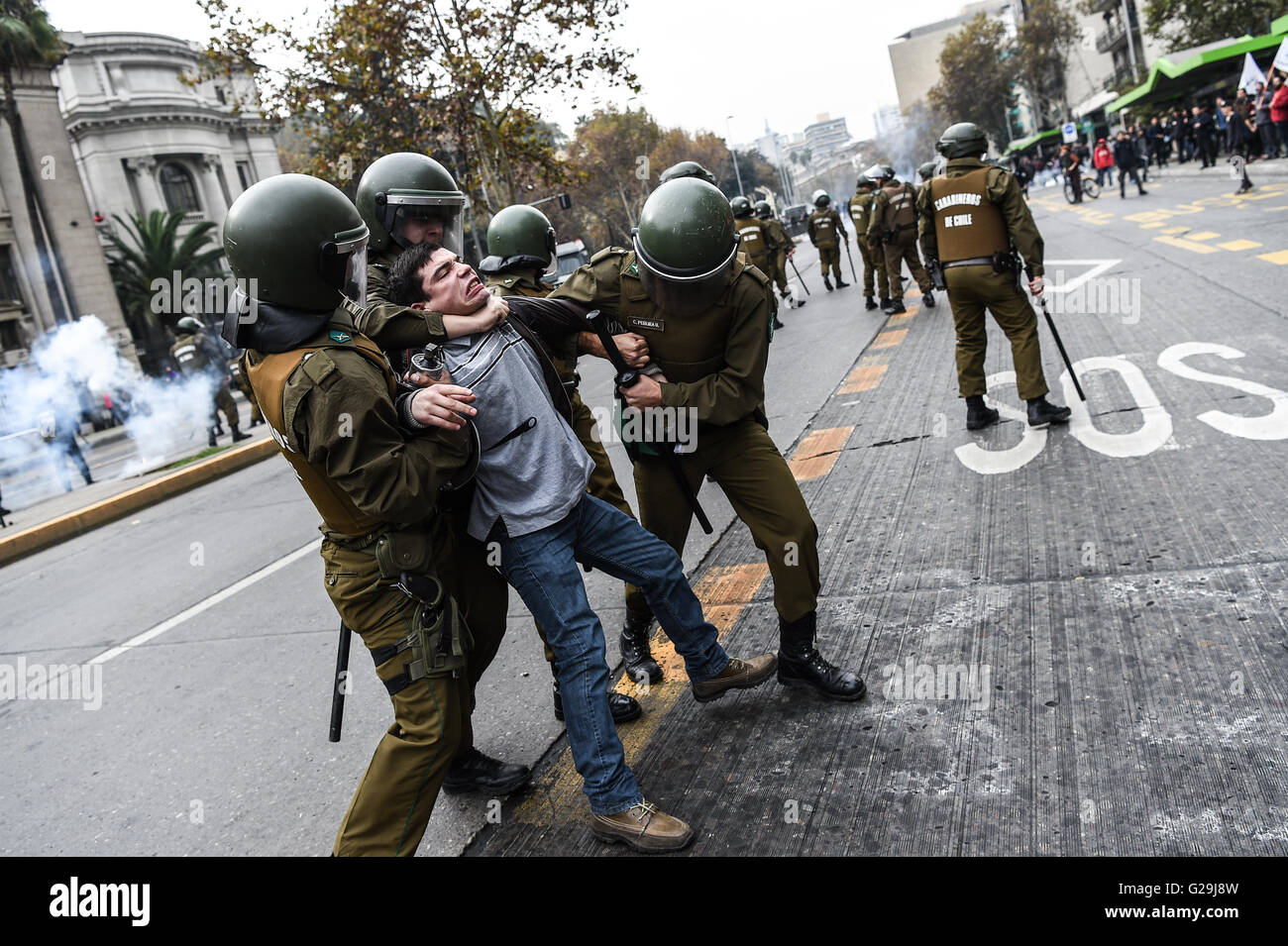 Santiago, Chile. 26th May, 2016. Riot Police arrest a demonstrator ...