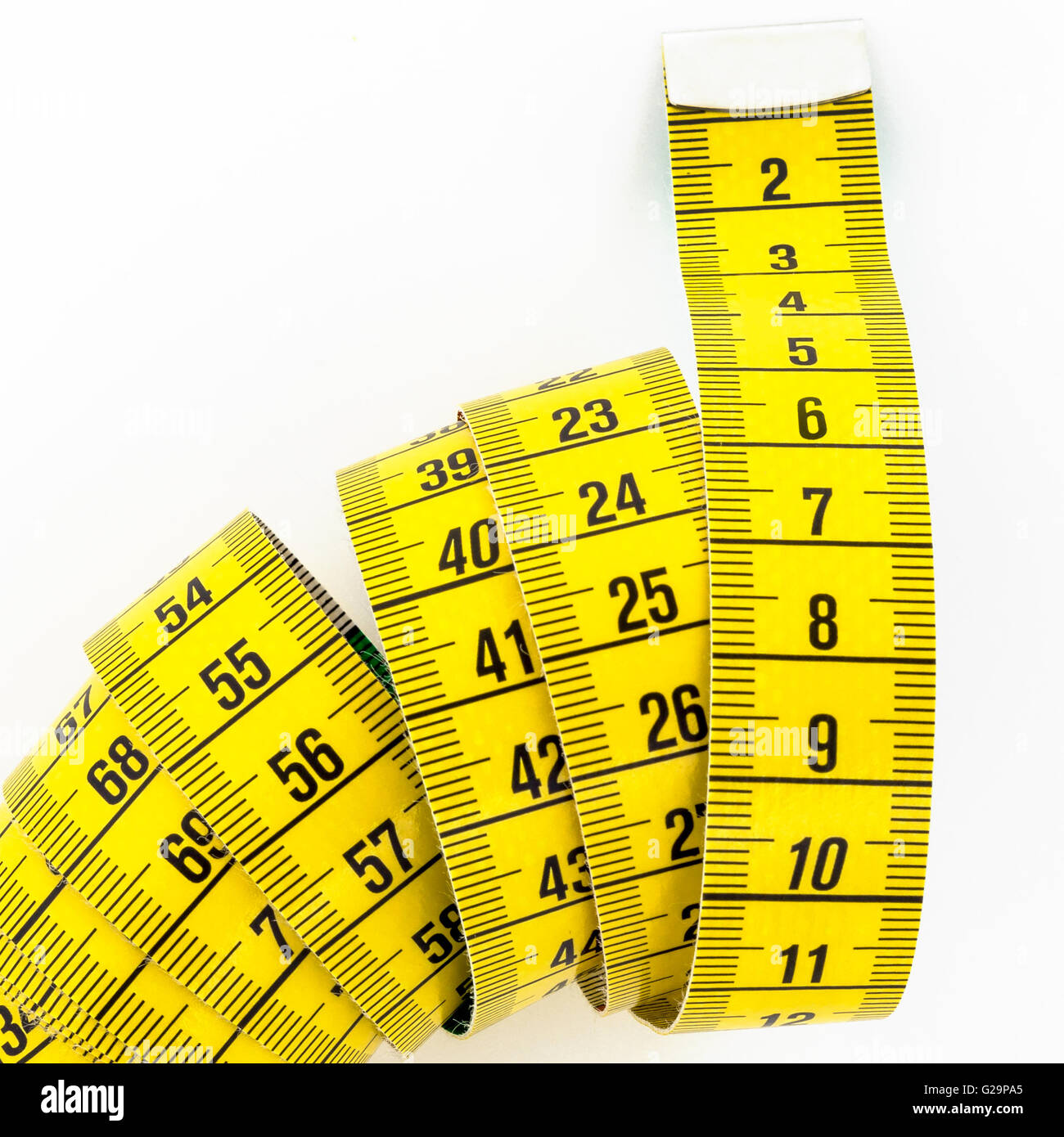 Measuring tape isolated on white background Stock Photo - Alamy
