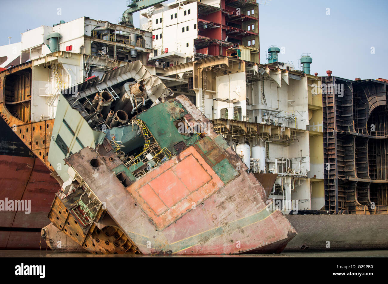 Partially broken down ocean ship in a ship breaking yard in Chittagong ...