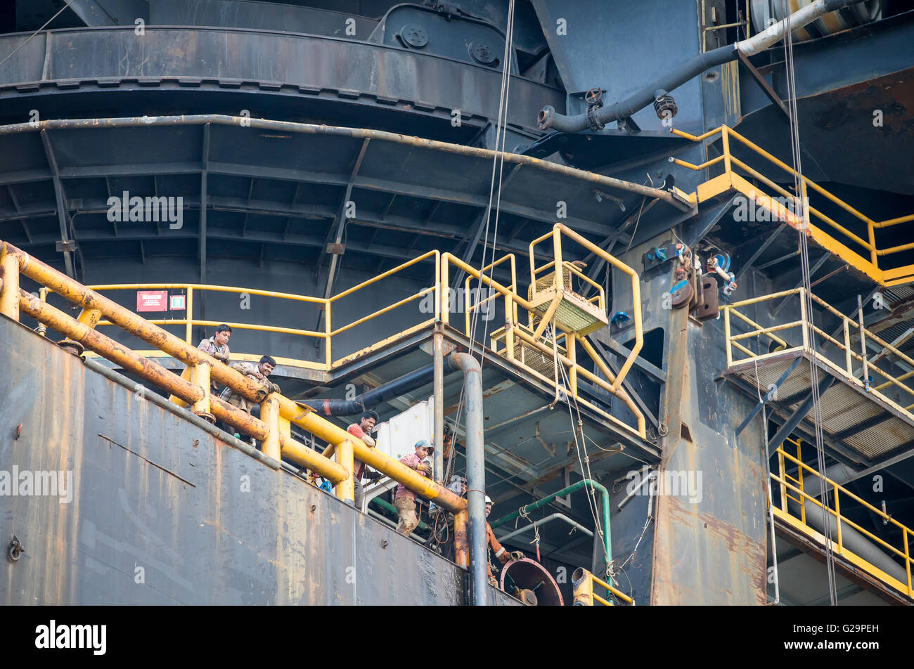 Partially broken down ocean ship in a ship breaking yard in Chittagong ...