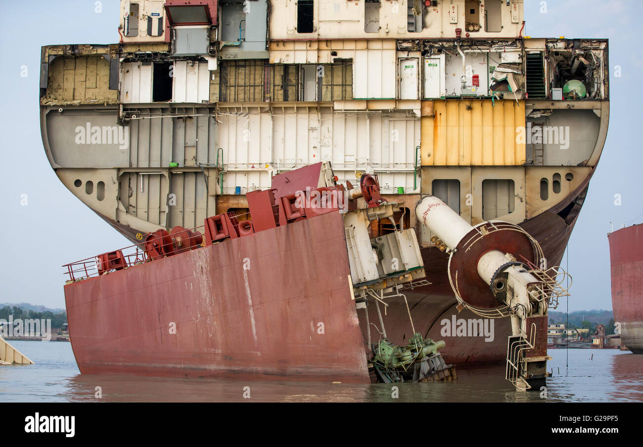 Partially broken down ocean ship in a ship breaking yard in Chittagong ...