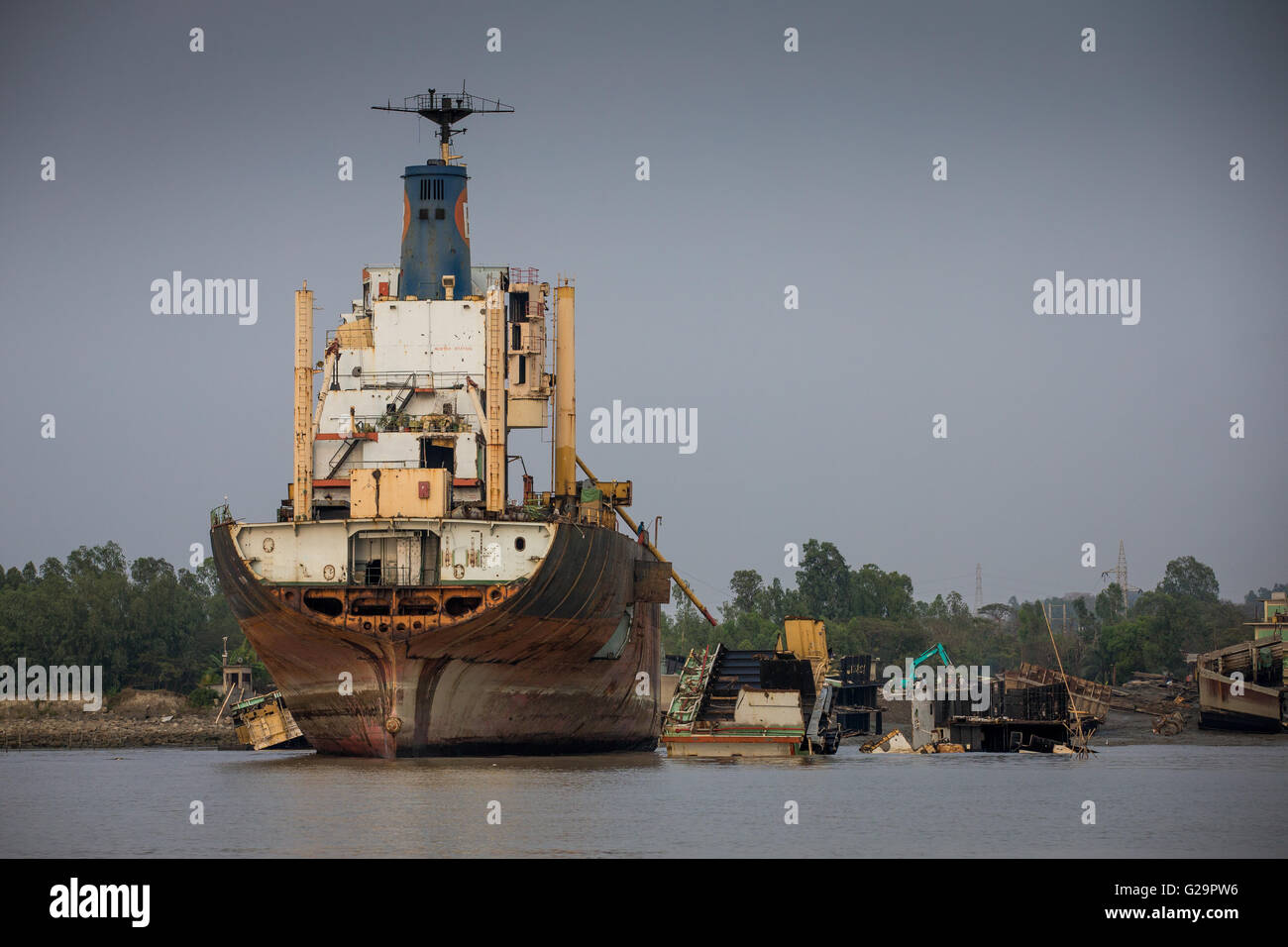 Partially broken down ocean ship in a ship breaking yard in Chittagong ...