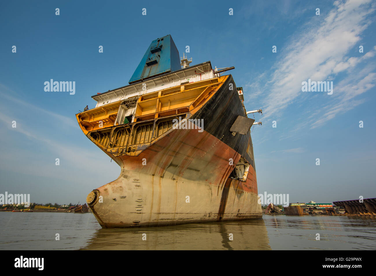 Partially broken down ocean ship in a ship breaking yard in Chittagong ...