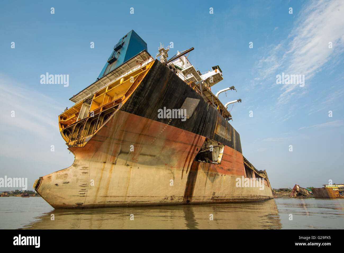 Partially broken down ocean ship in a ship breaking yard in Chittagong ...