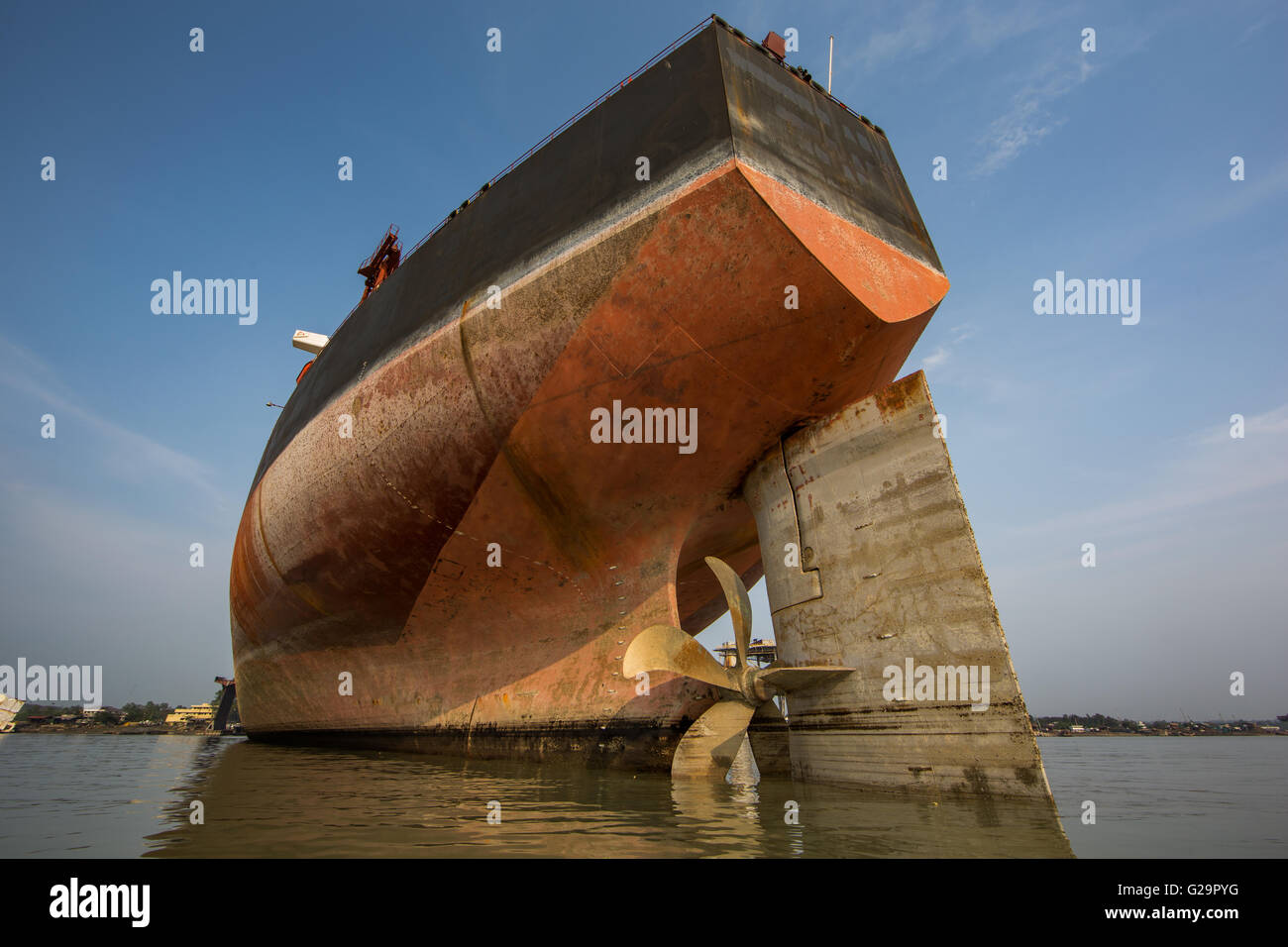 Partially broken down ocean ship in a ship breaking yard in Chittagong ...