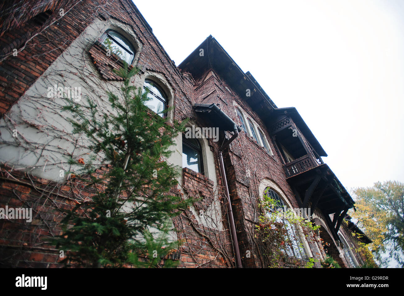 Old abandoned brick mystic mansion. Gothic building at autumn Stock ...