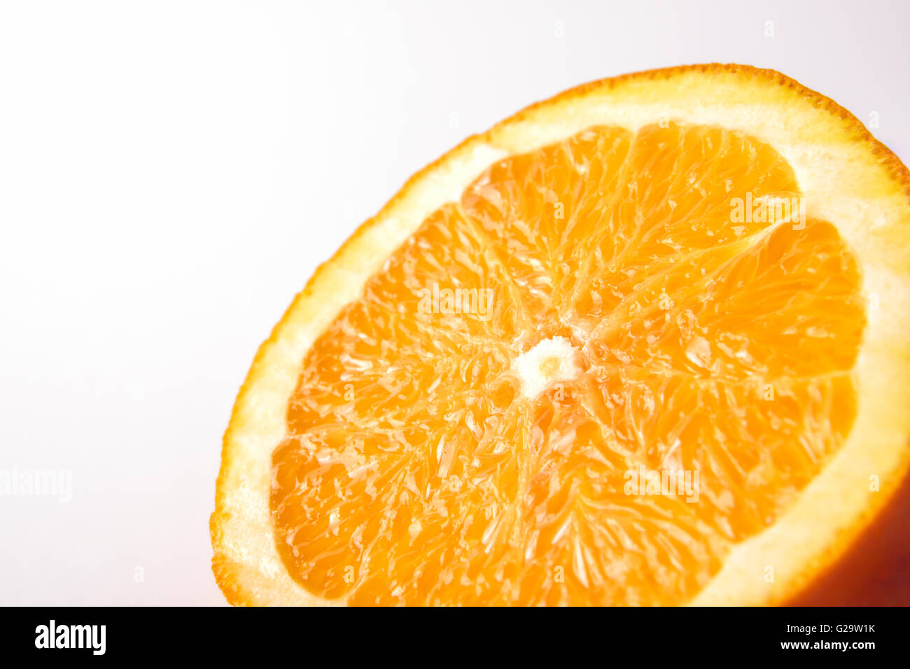 Section of orange isolated on white. Horizontal composition. Front view ...