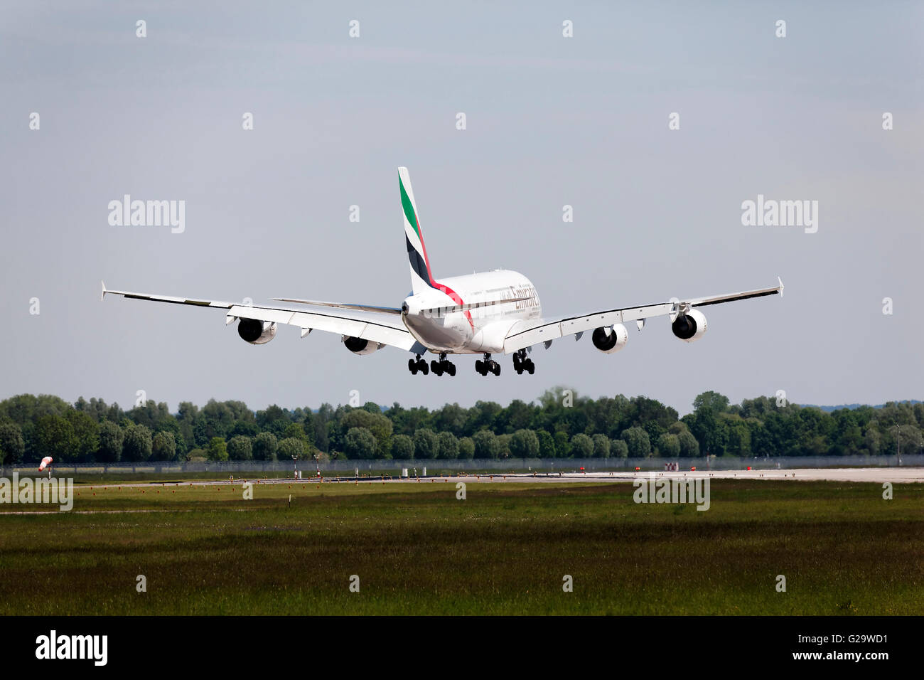 Emirates Airbus A380-800 passenger aircraft seen from behind, on ...
