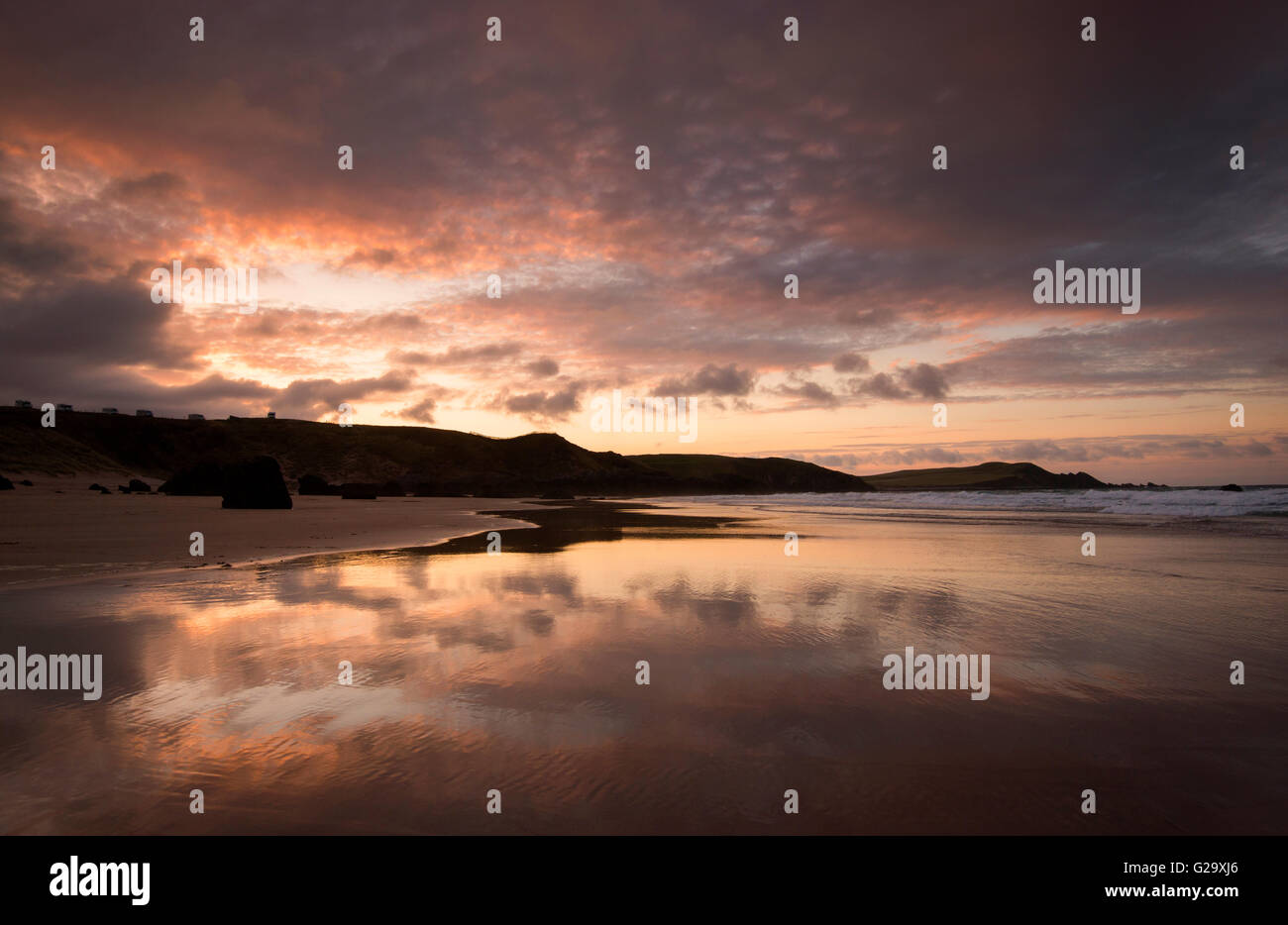 Sunset reflections on Sango Beach in Durness, Sutherland Scotland UK ...