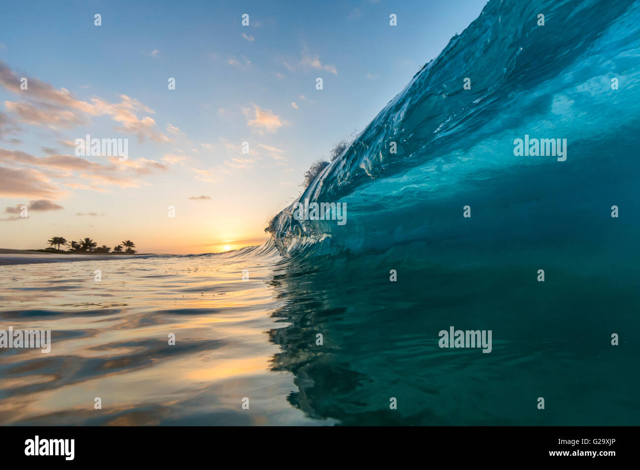 Wave during sunrise hi-res stock photography and images - Alamy