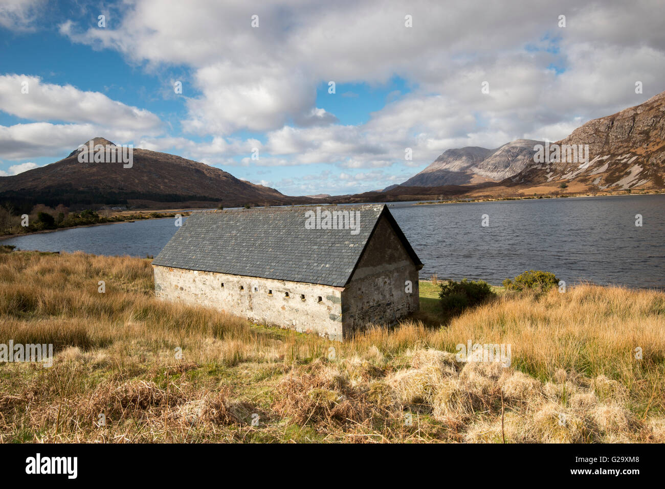 Lone Cottage by the side of Loch More in Sutherland Scotland UK Stock ...