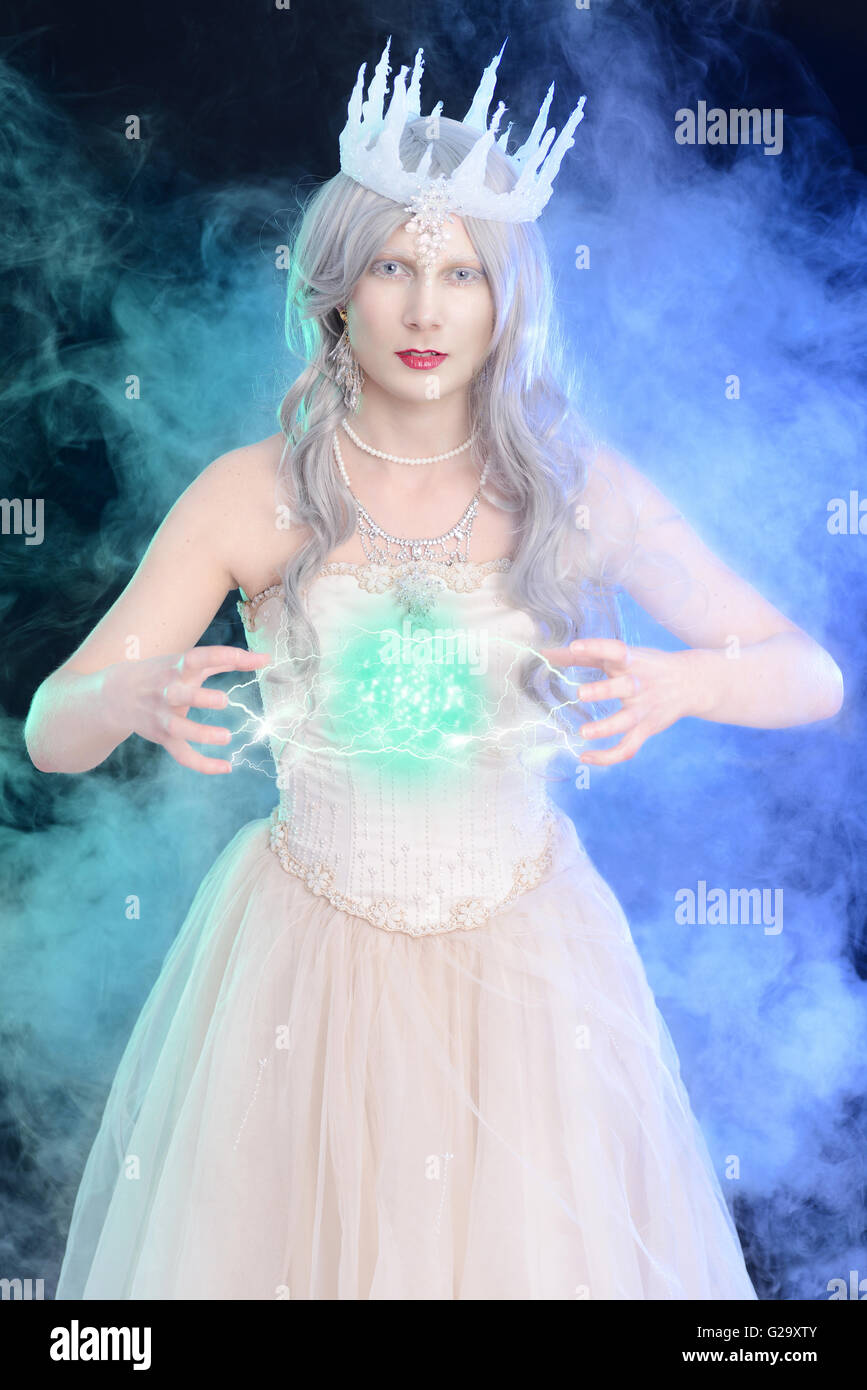 evil ice queen with ball of magic Stock Photo - Alamy