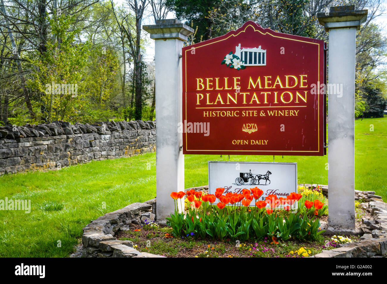 Stately signpost and colorful flowers welcome guests to the Belle Meade ...