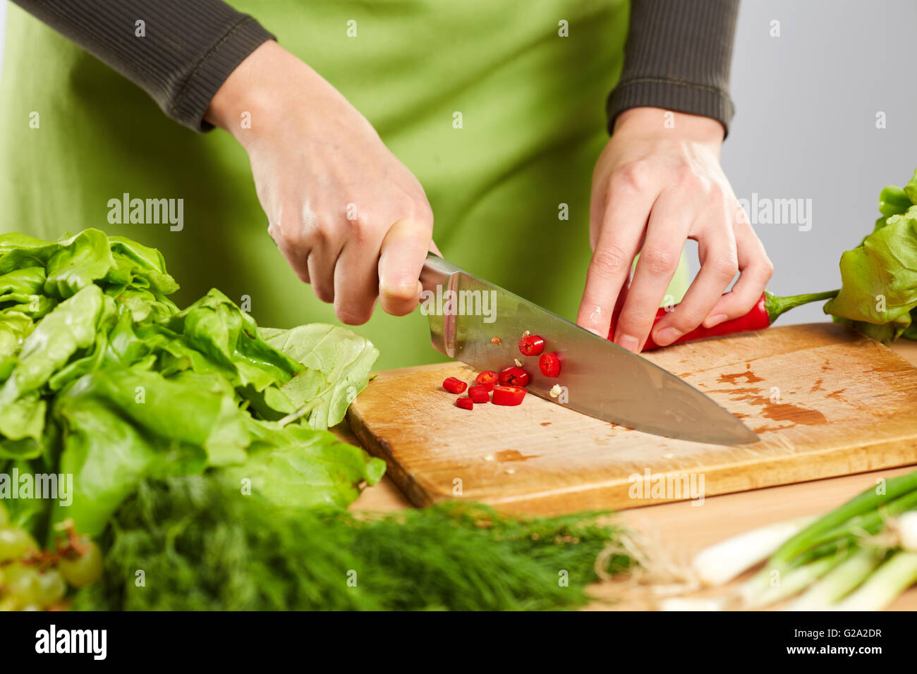 Womans hands chopping fresh onion hi-res stock photography and images ...