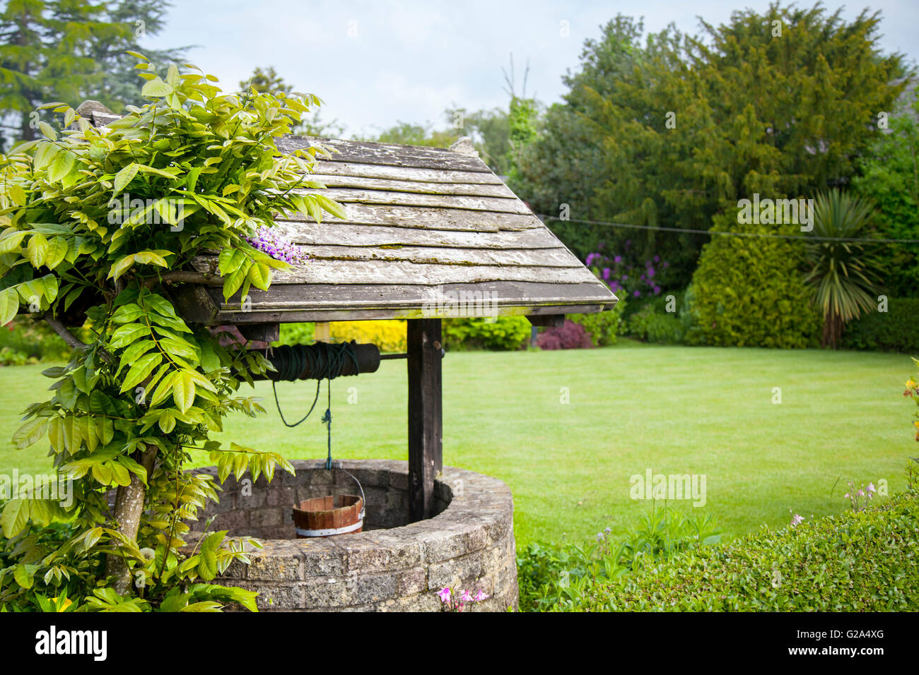 Stone tiled Wishing type large well as a garden feature in Southport ...