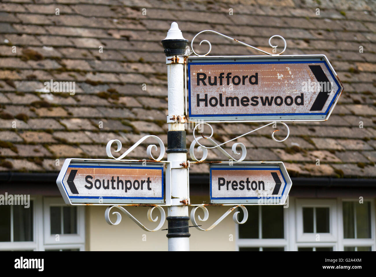 Old Victorian village road directional sign, Old UK signpost in Mere ...
