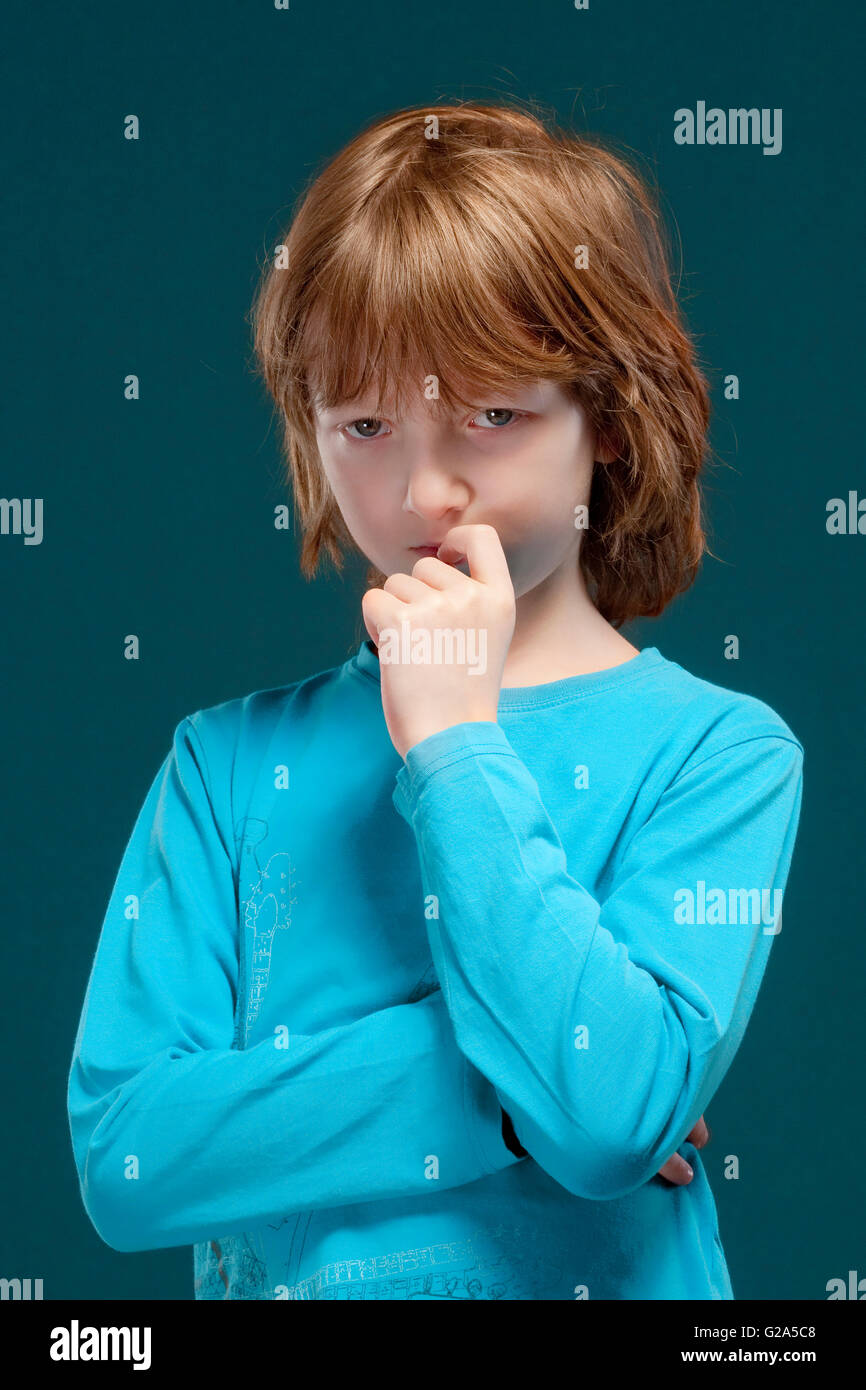 Boy thinking face expression hi-res stock photography and images - Alamy