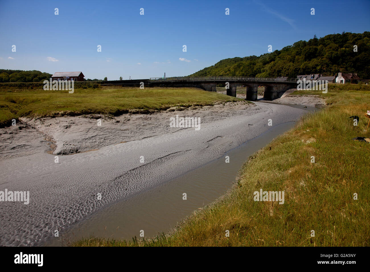 Bridge over a tidal river during ebb in Brittany France Stock Photo - Alamy
