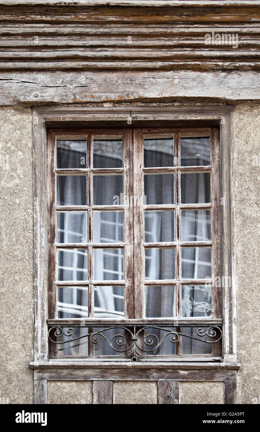 Old antique window on historic house in the city of Dinan France Stock ...