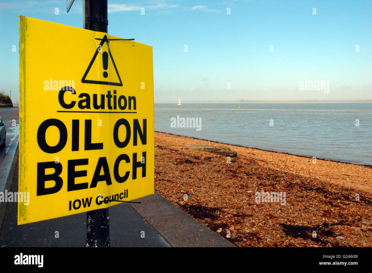 Oil on beach warning sign hi-res stock photography and images - Alamy