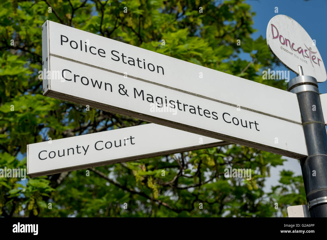 Sign pointing to Doncaster Police Station and Crown, Magistrates' and ...