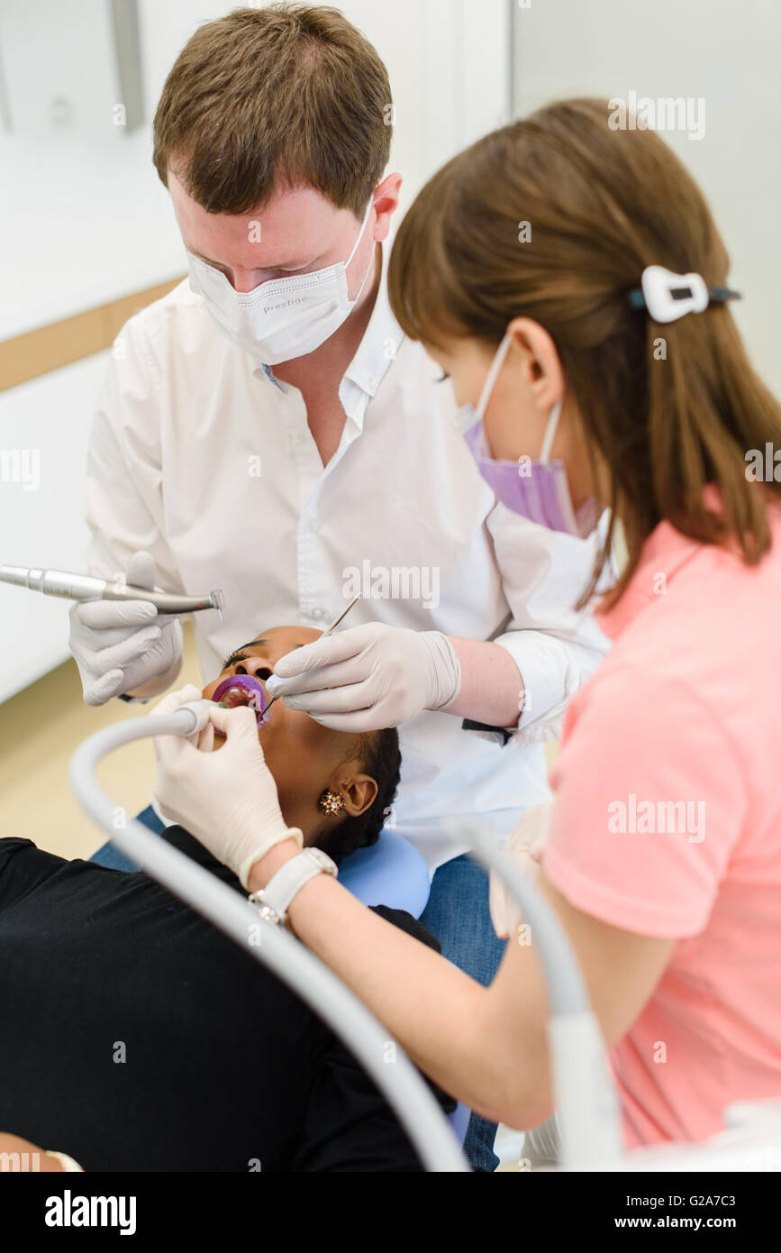 Nurse cleaning teeth hi-res stock photography and images - Alamy