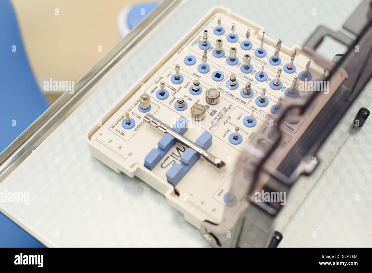 Plastic case a set of drill bits with color-coded health. Tools for ...