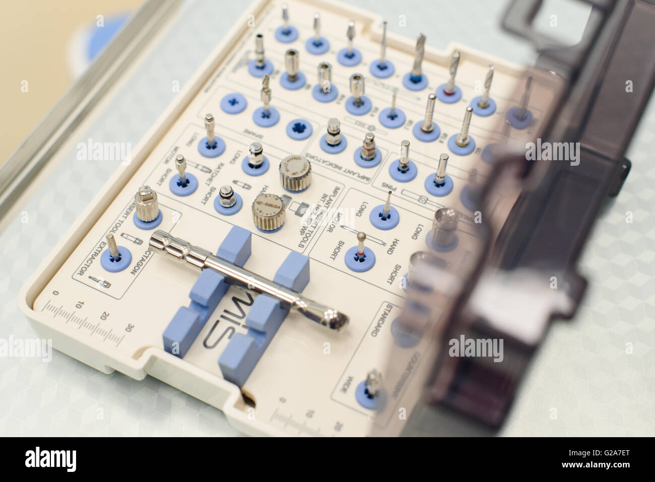 Plastic case a set of drill bits with color-coded health. Tools for ...