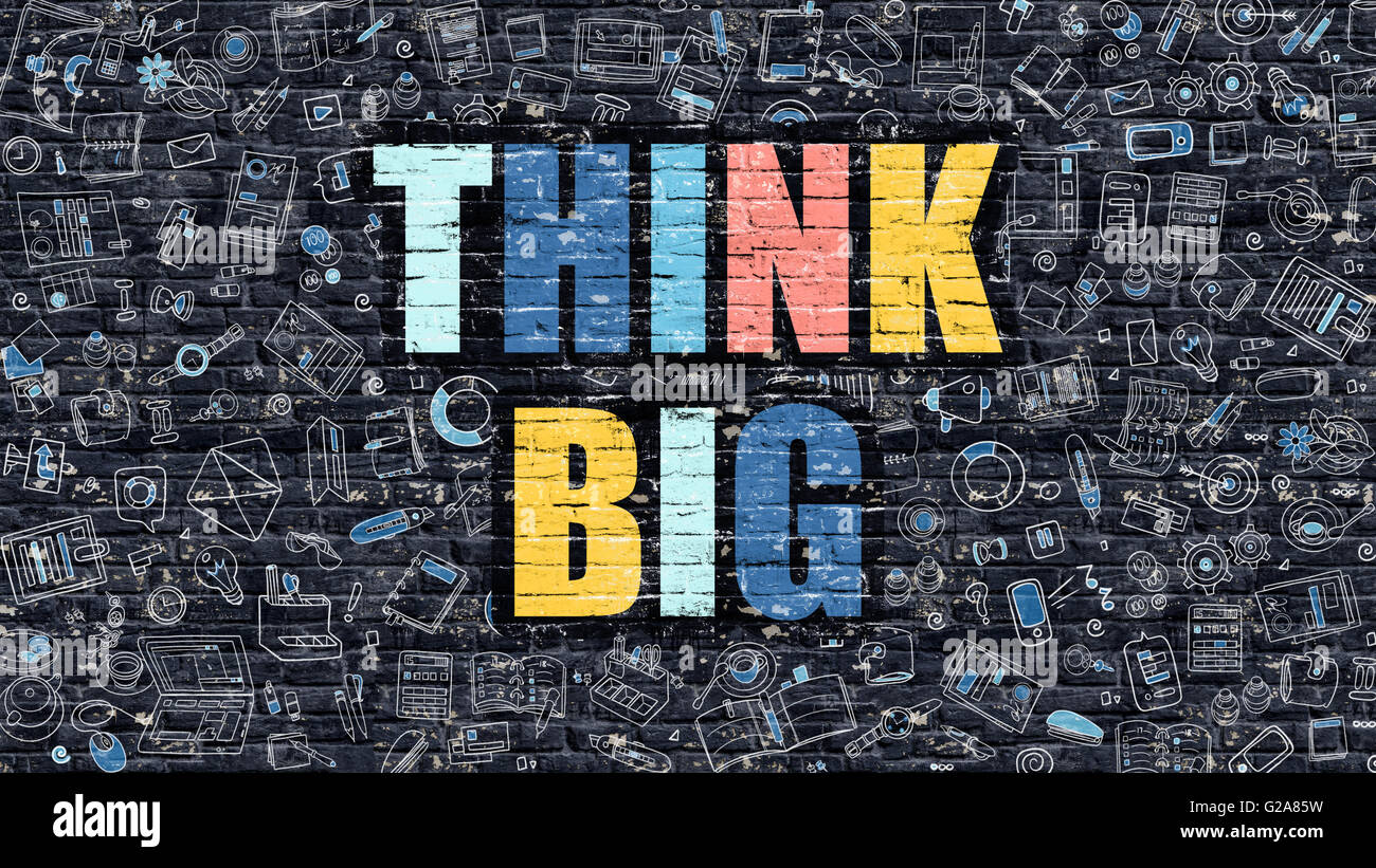 Think Big on Dark Brick Wall Stock Photo - Alamy