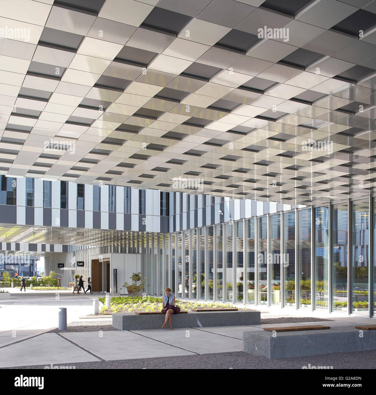 Building cantilevering over ground floor entrance square. Fornebuporten ...