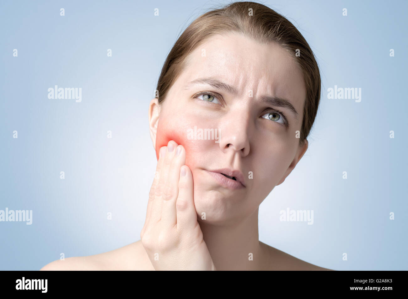 Young woman suffering from toothache Stock Photo - Alamy