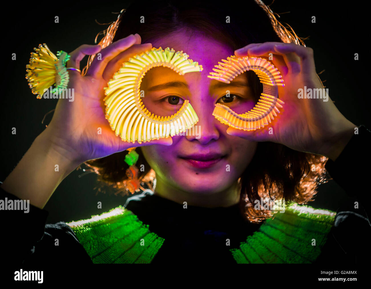 Designer Wanshu Li with her Luminous jewellery that was inspired by ...